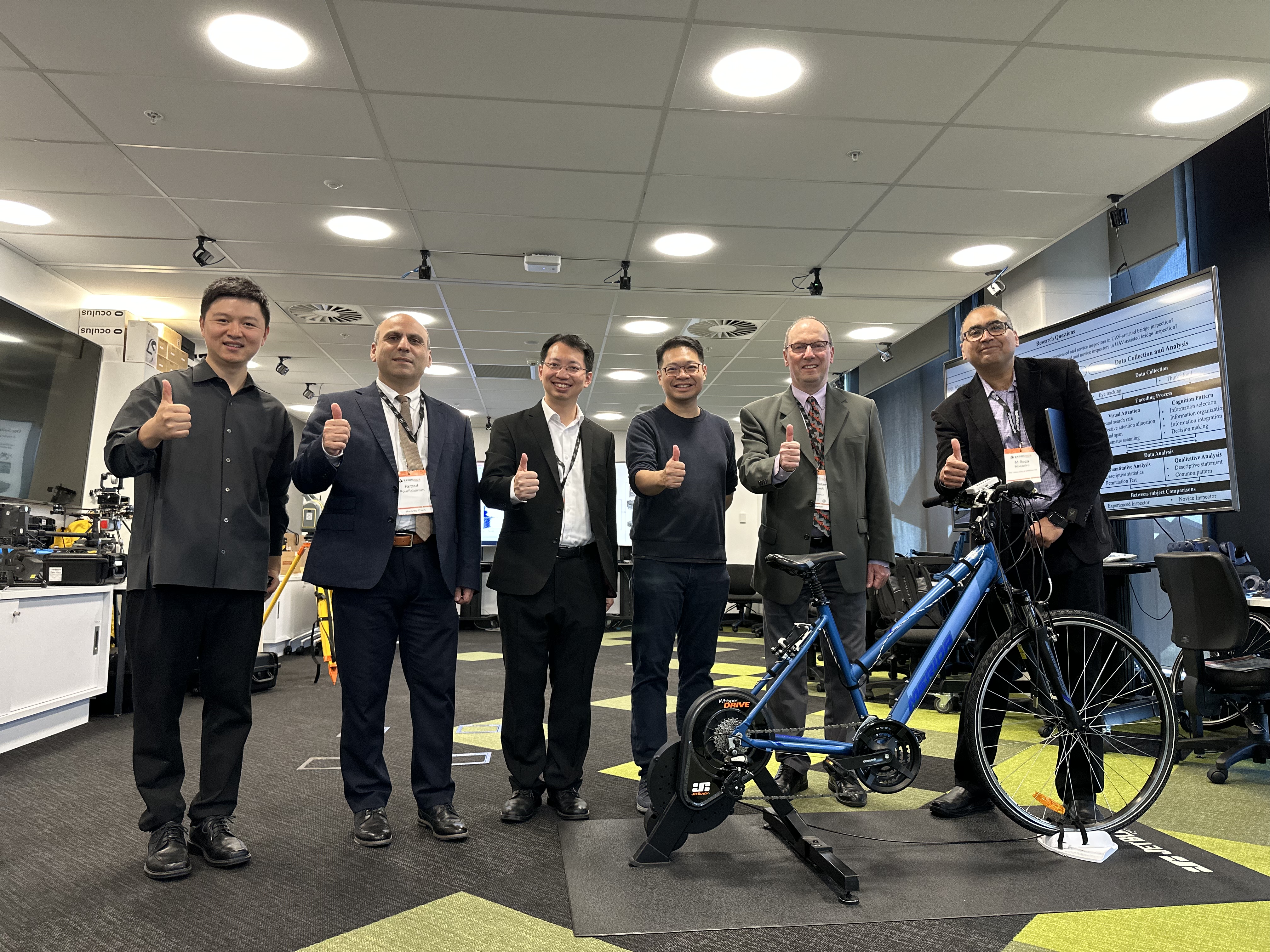 A distinguished group of SASBE2024 conference's VIPs visited the Smart Digital Lab | Yang Zou